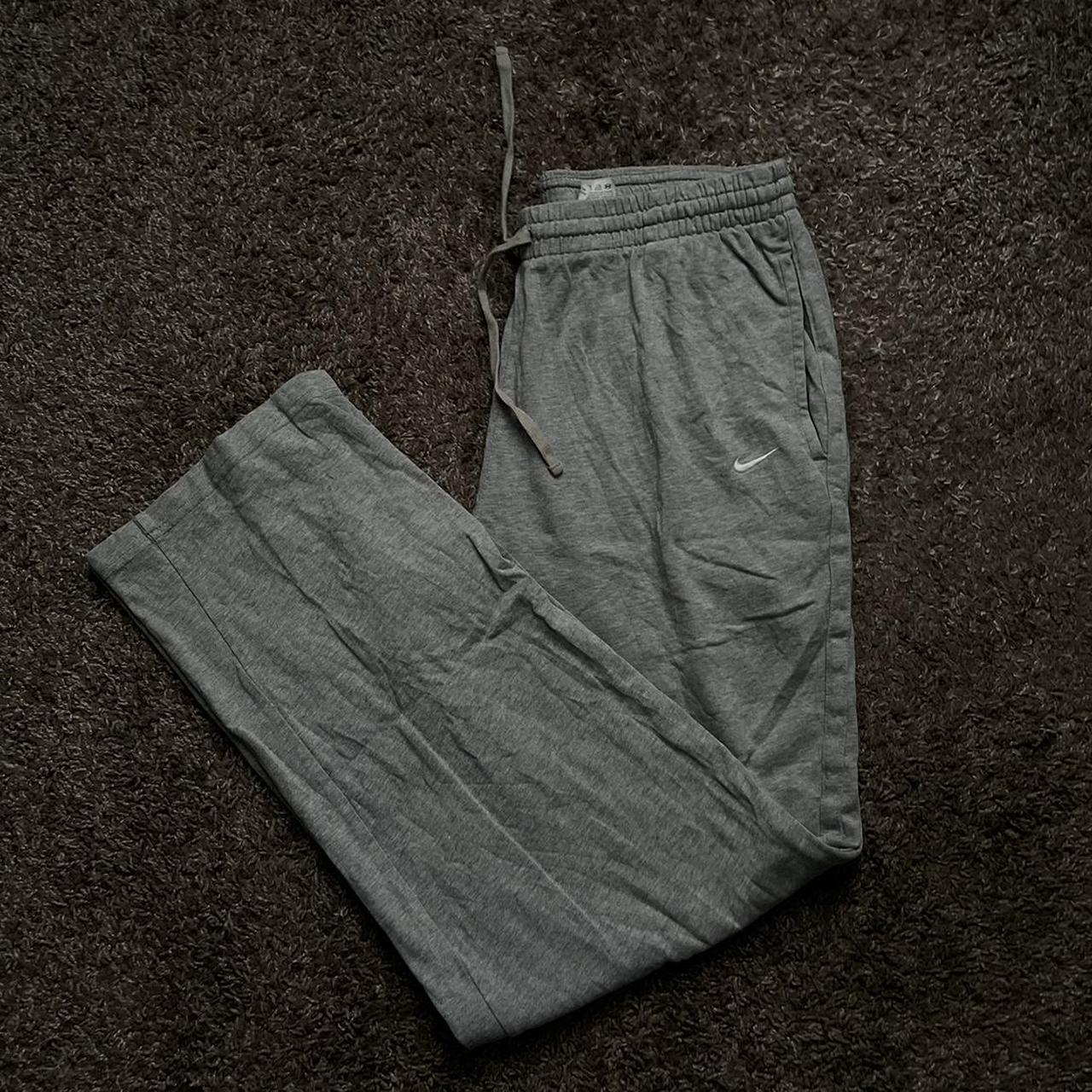 Grey Nike Sweatpants No flaws W: 16 in L: 29... - Depop