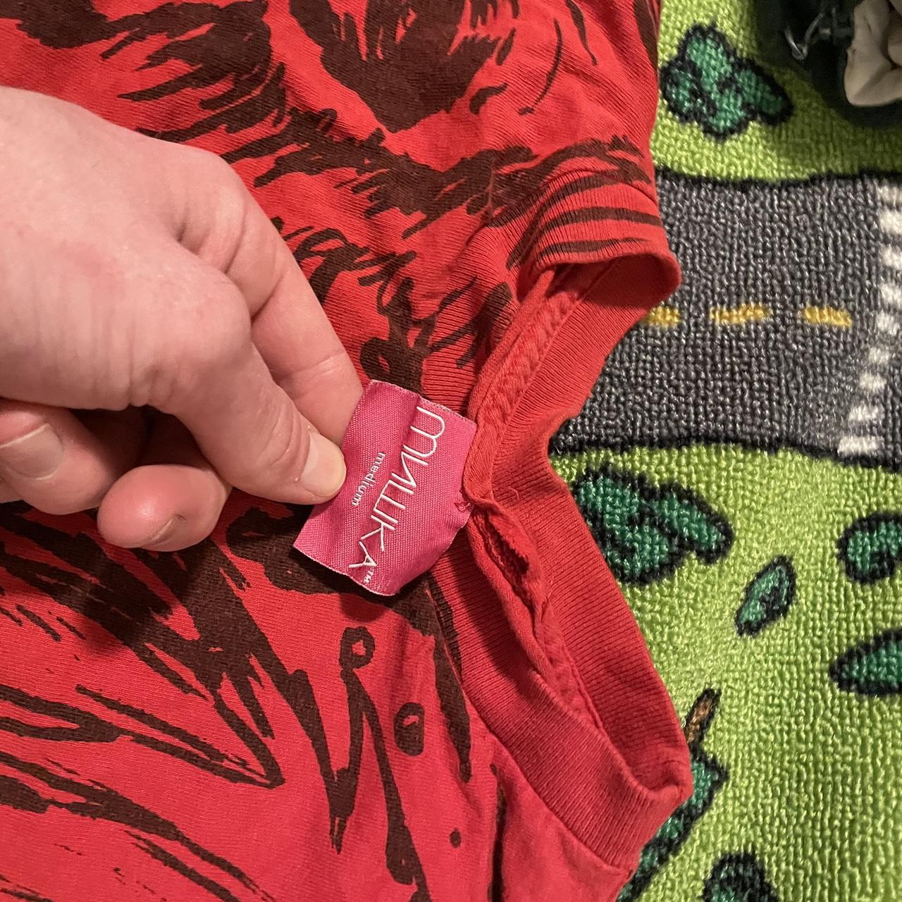 Super sick vintage mnwka shirt damage on the back... - Depop