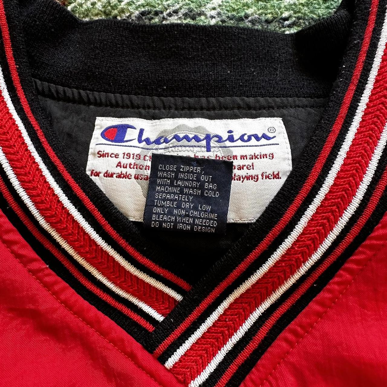 Miami Champion Jacket Quirks: two black stains on... - Depop