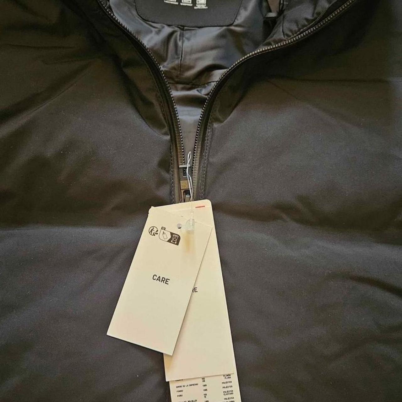 UNIQLO Black Seamless down 3d cut parka UNIQLO Brand... - Depop