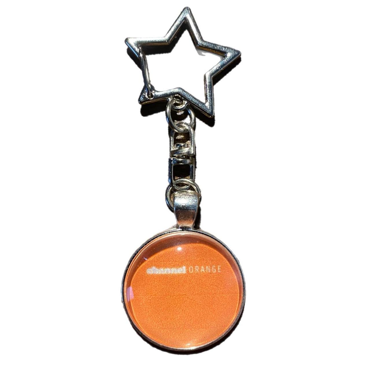 frank ocean channel orange star keychain pendant is... - Depop
