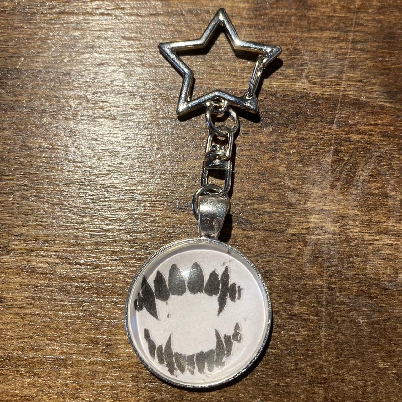 fangs star keychain pendant is 1” or 25mm worldwide... - Depop