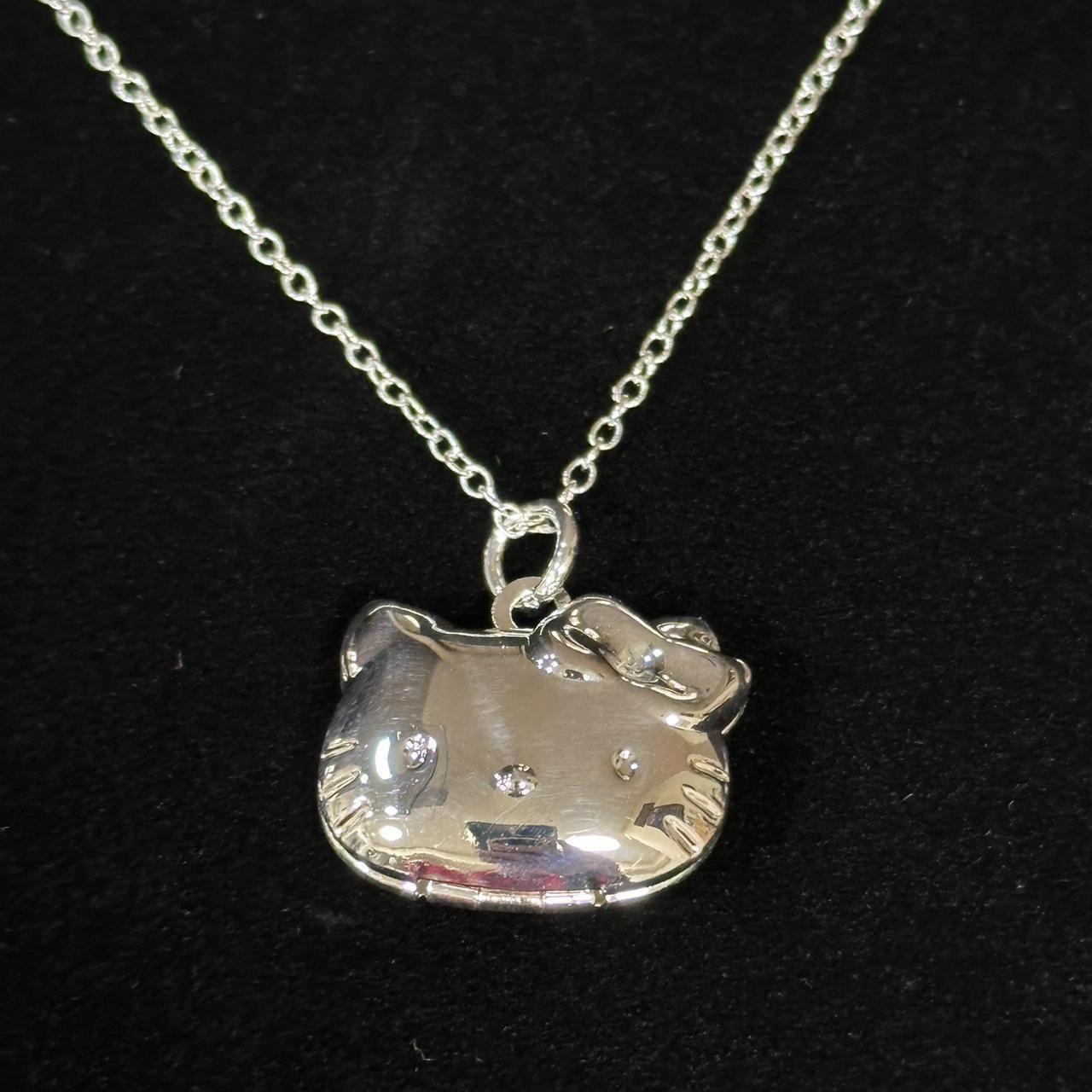 New Hello Kitty locket and necklace. Light weight... - Depop