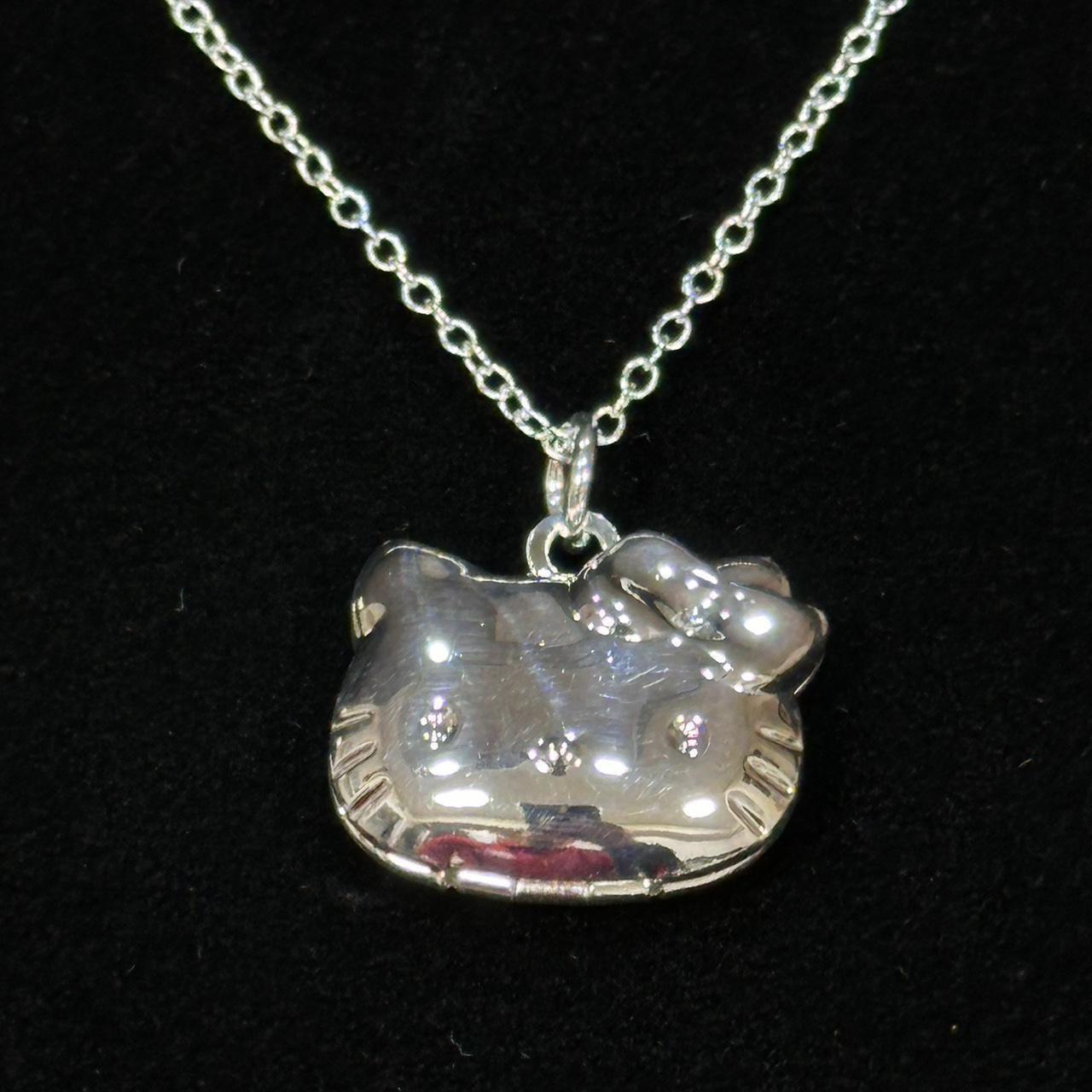 New Hello Kitty locket and necklace. Light weight... - Depop