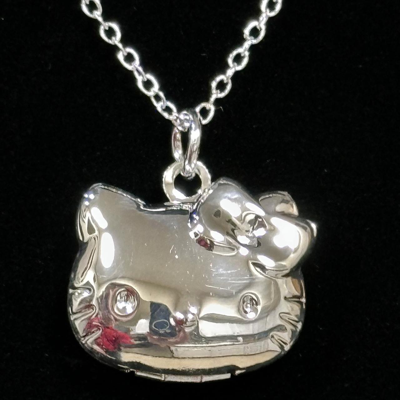 New Hello Kitty locket and necklace. Light weight... - Depop