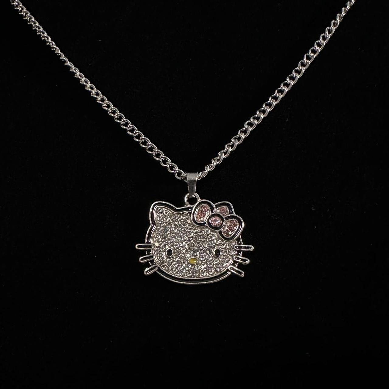 Hello Kitty silver tone necklace and pendant. Big... - Depop