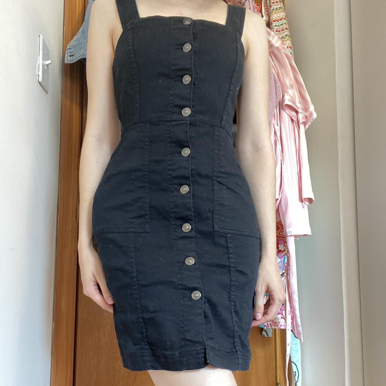 Black stretchy denim button-up dress by Divided by... - Depop