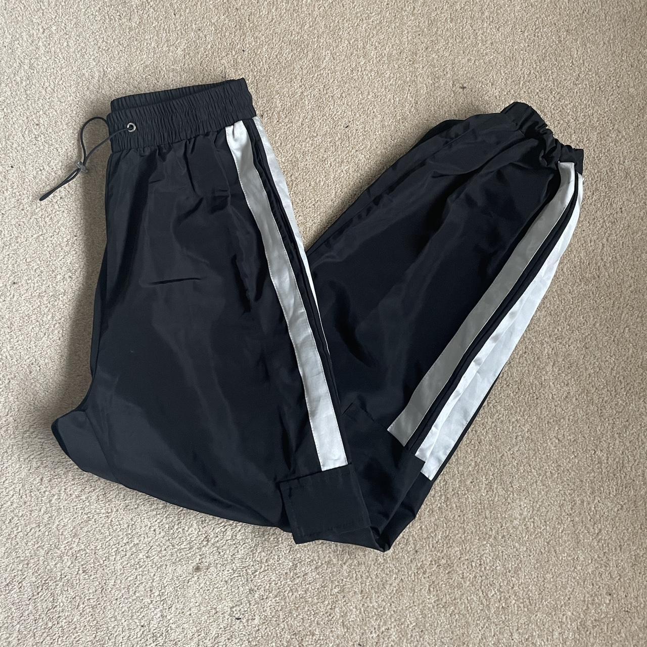 Black and white trackies. Cargo style trousers with... - Depop