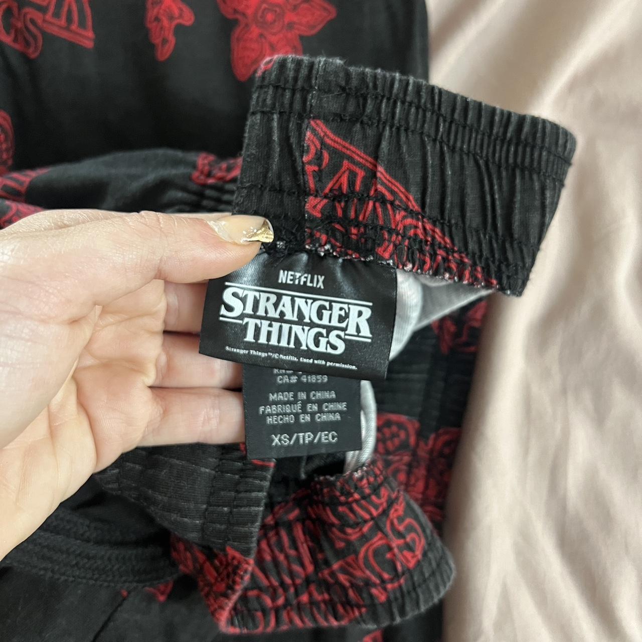 Stranger Things black & red loungewear pants... | Depop