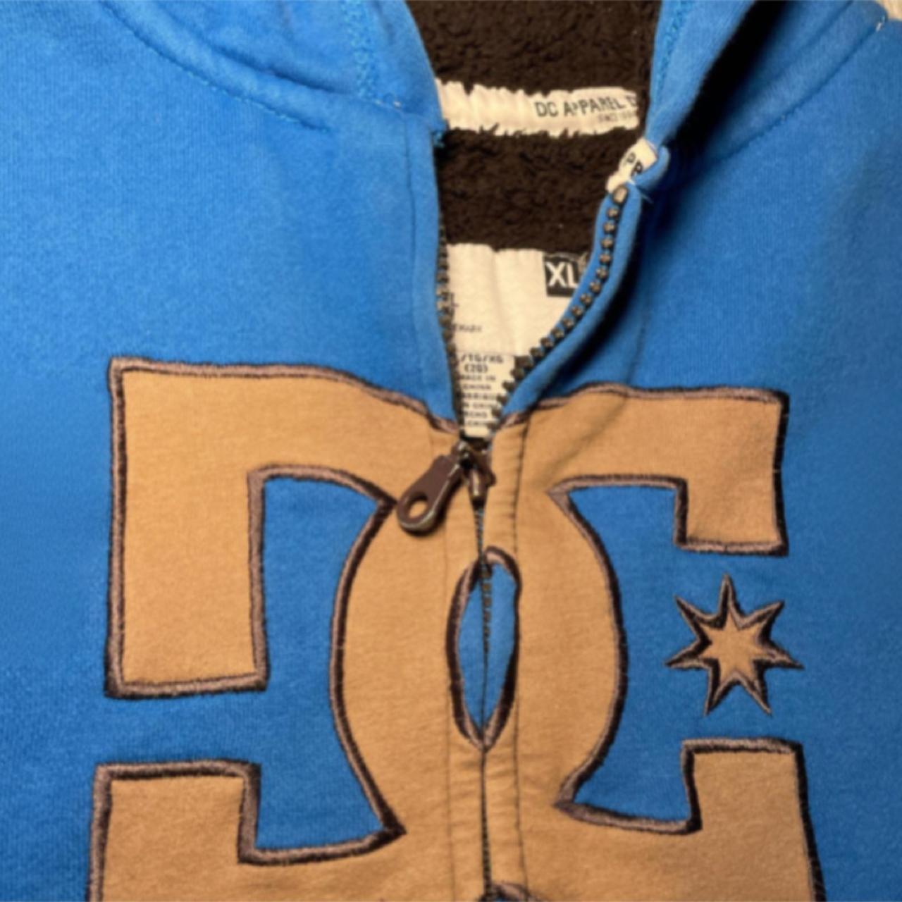 XL blue DC shoes zip up with black fleece... - Depop