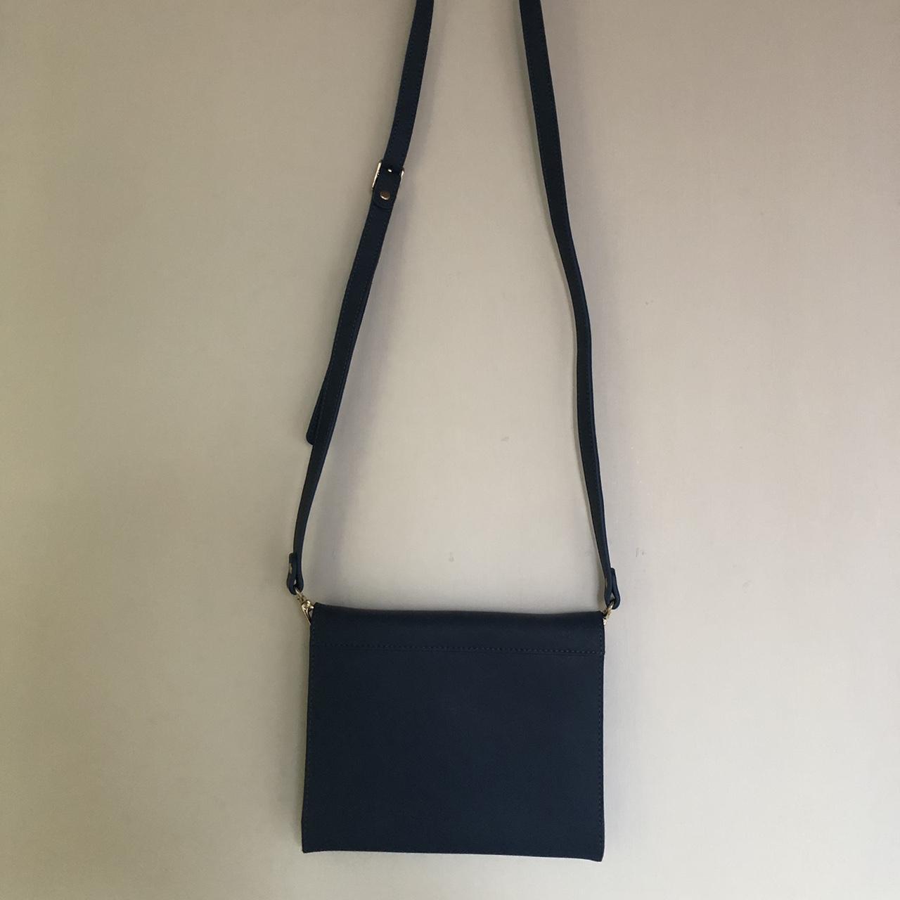 The Daily Edited navy messenger style mini bag With... - Depop