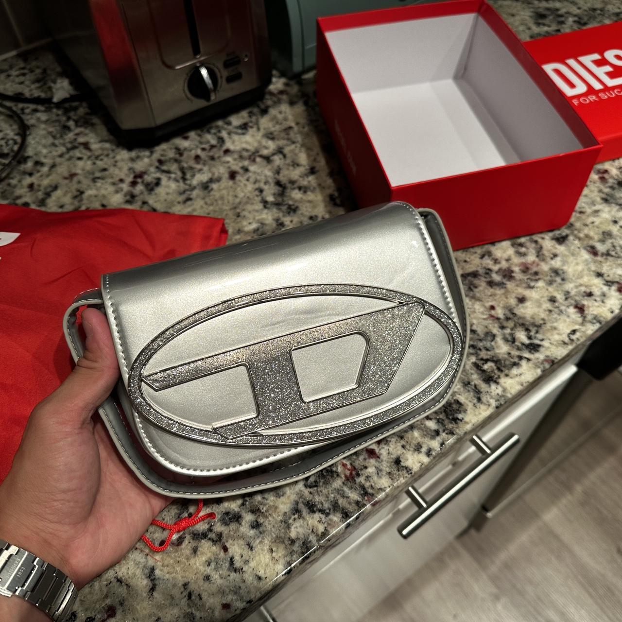 Silver DIESEL bag . Comes as pictured w dust bag and... - Depop