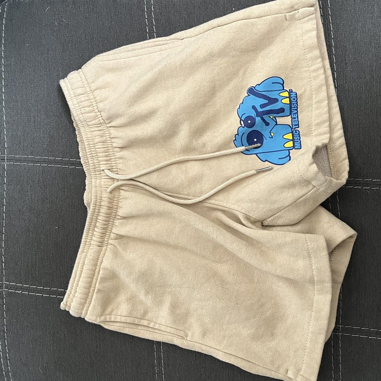 Great condition cream MTV shorts Contact for purchase - Depop