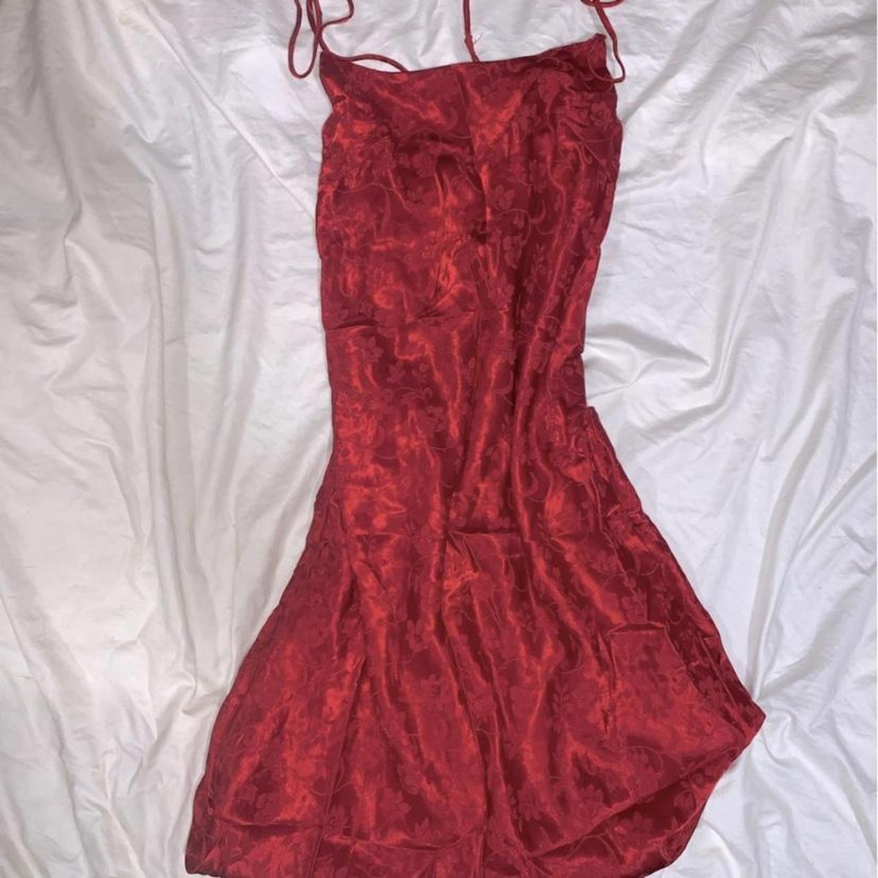 Long red silky dress with floral pattern. Criss... - Depop
