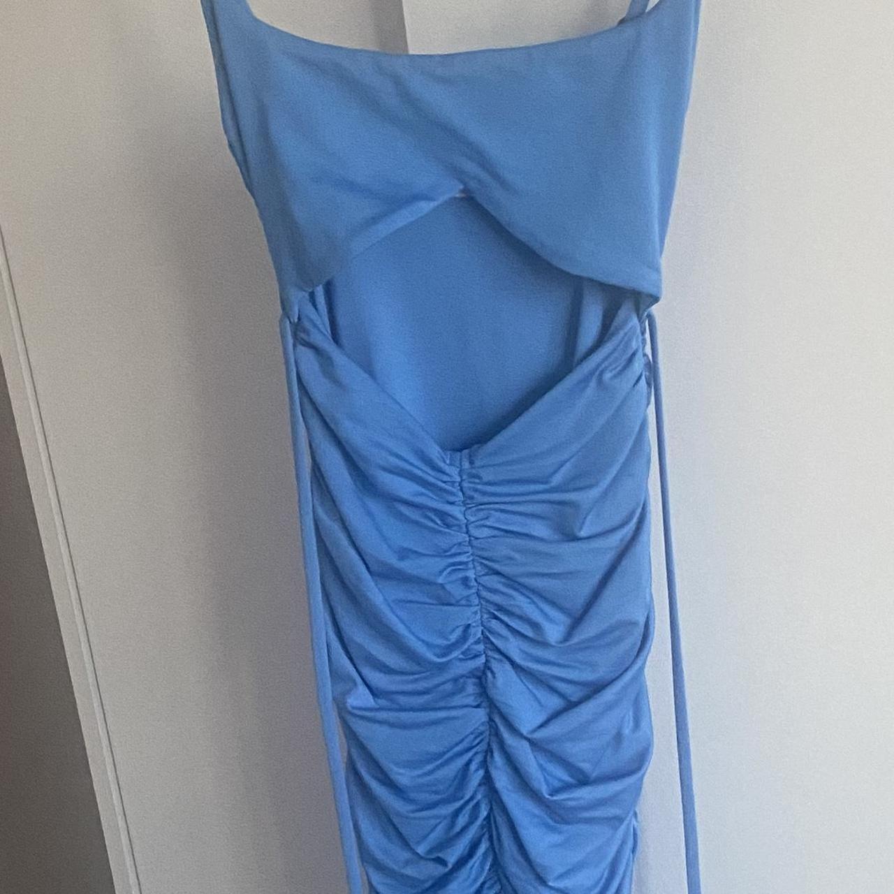 Blue ruched dress with cut out in mid riff from Oh... - Depop