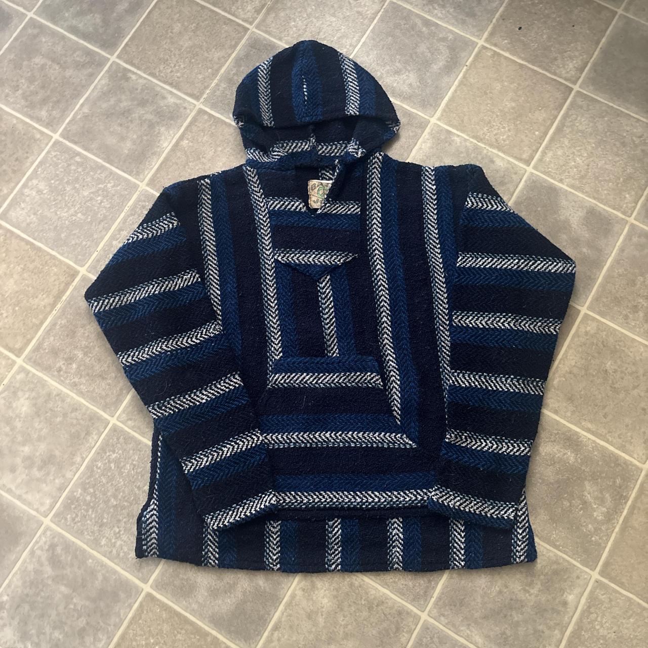 Blue and white Drug Rug Aztec-inspired hoodie with a... | Depop