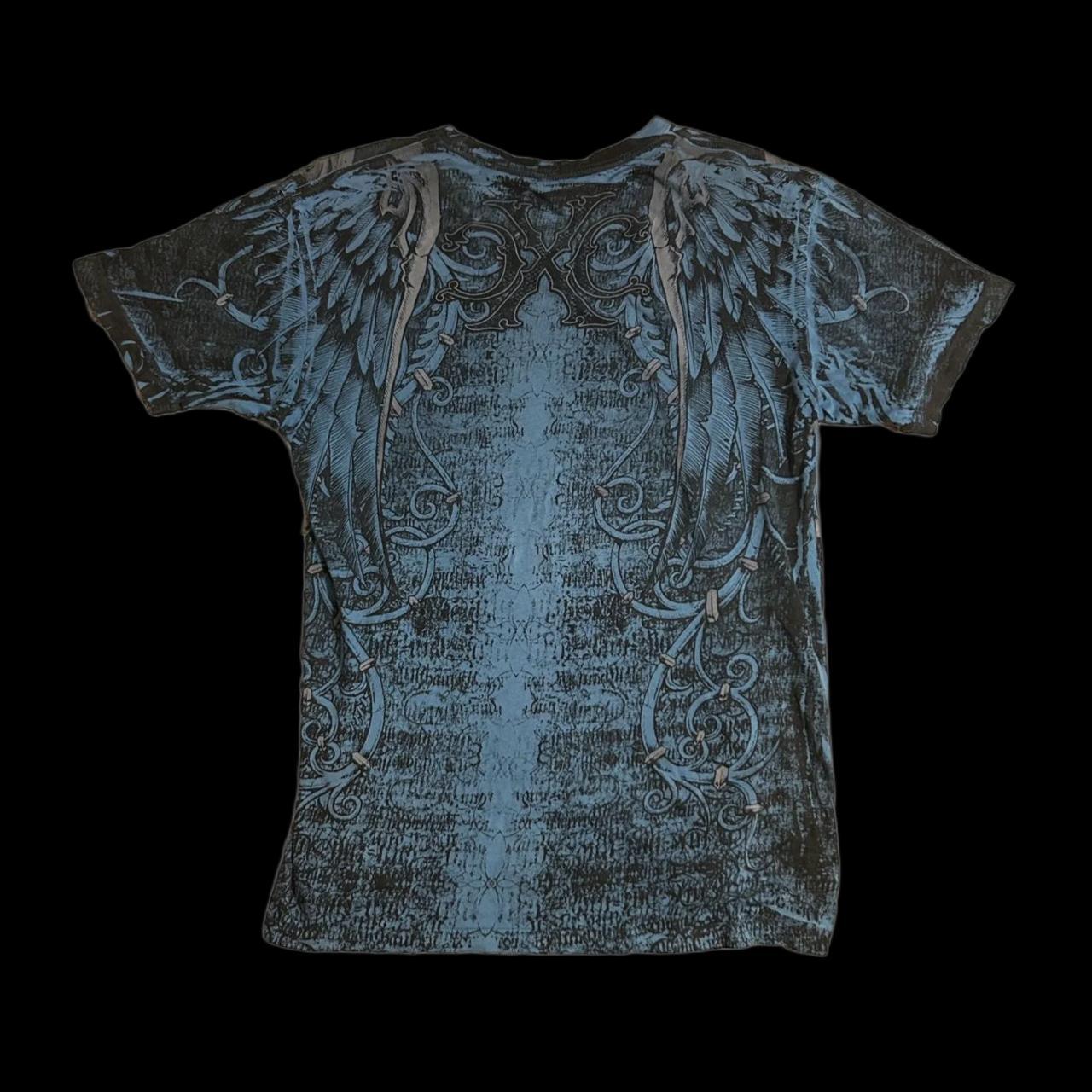 XTREME COUTURE TEE Cross Design on the front ... - Depop