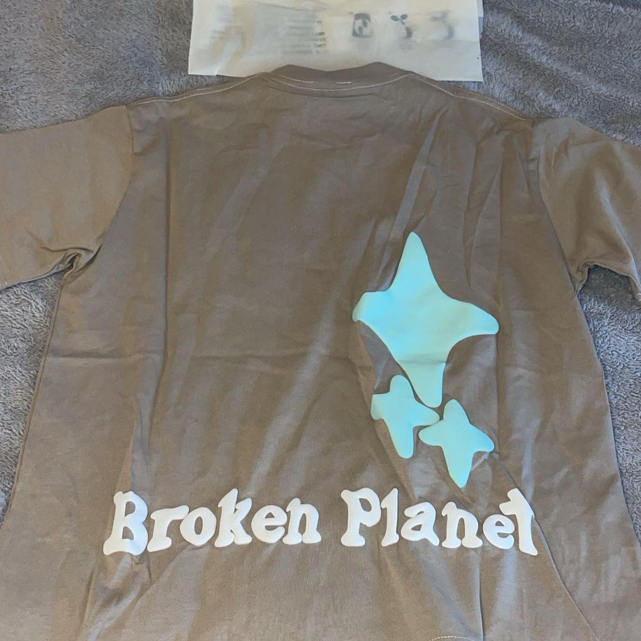 Broken planet the madness never ends tan tee Brand... | Depop
