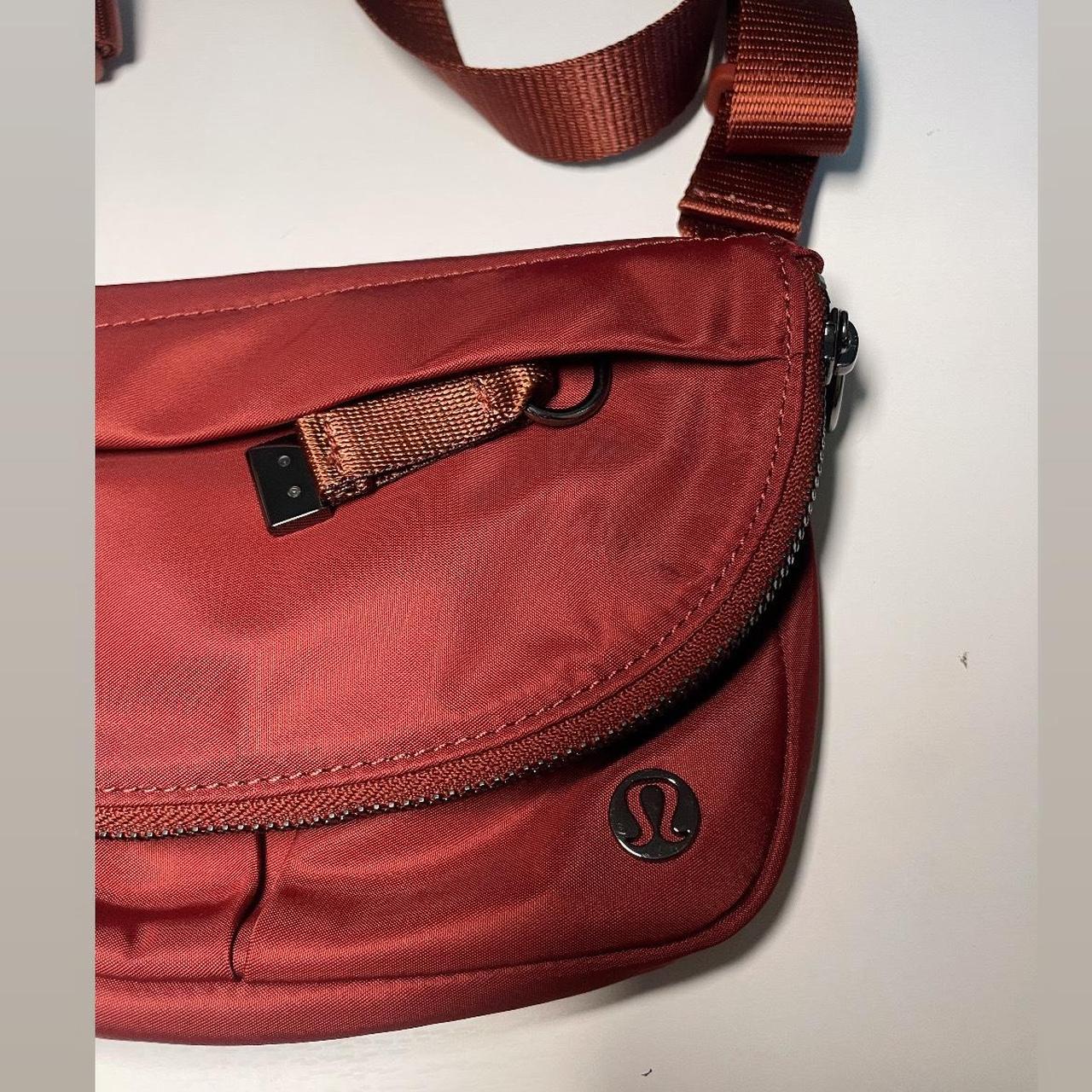 Lululemon red crossbody bag with adjustable strap -... - Depop