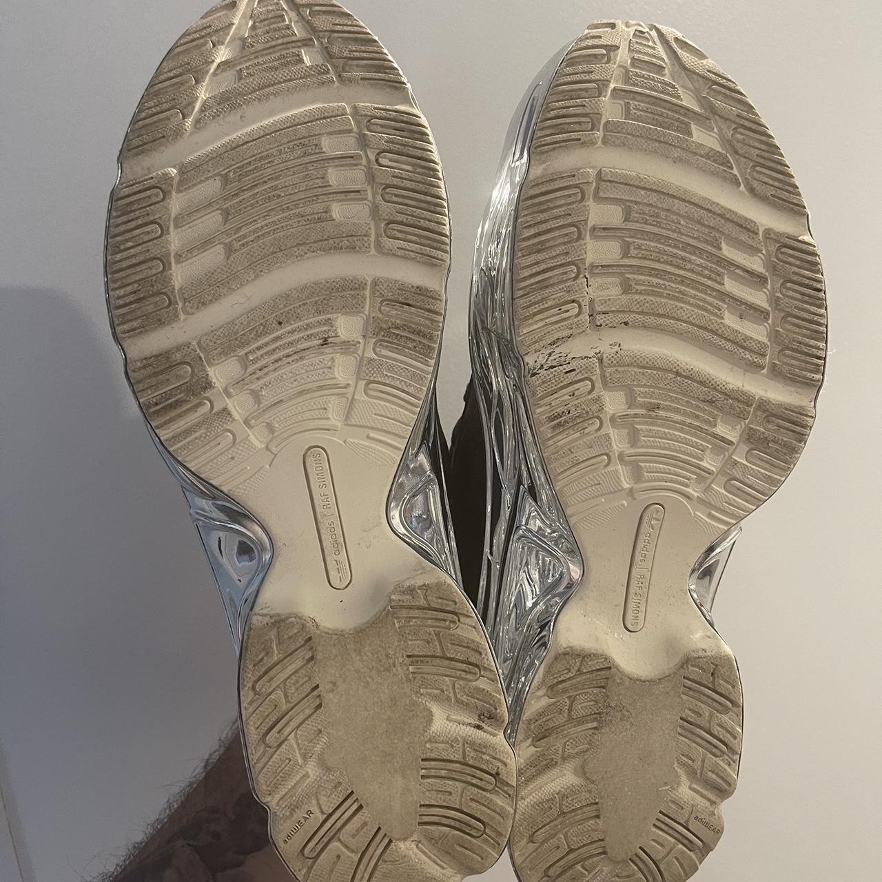 RAF SIMONS x adidas, Metallic Ozweego [Black/Chrome]... - Depop