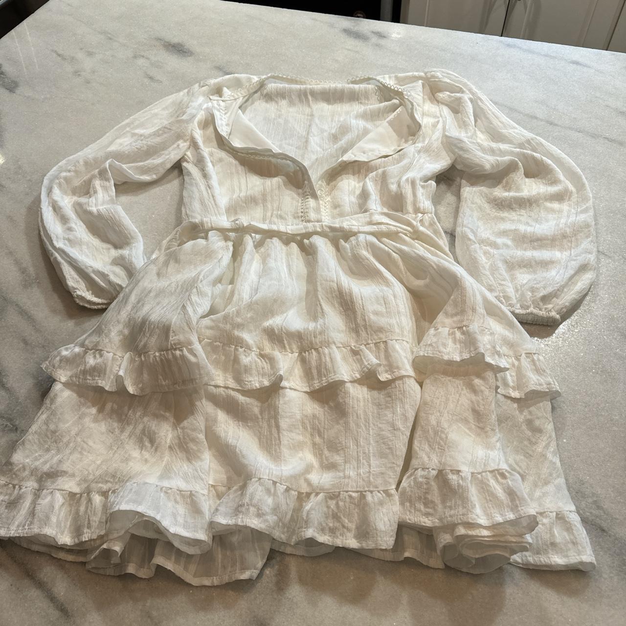 White long sleeve ruffle dress. Would be perfect for... - Depop