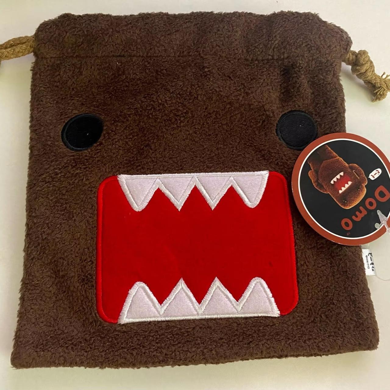 Domo pocket bag with drawstring closure - Depop