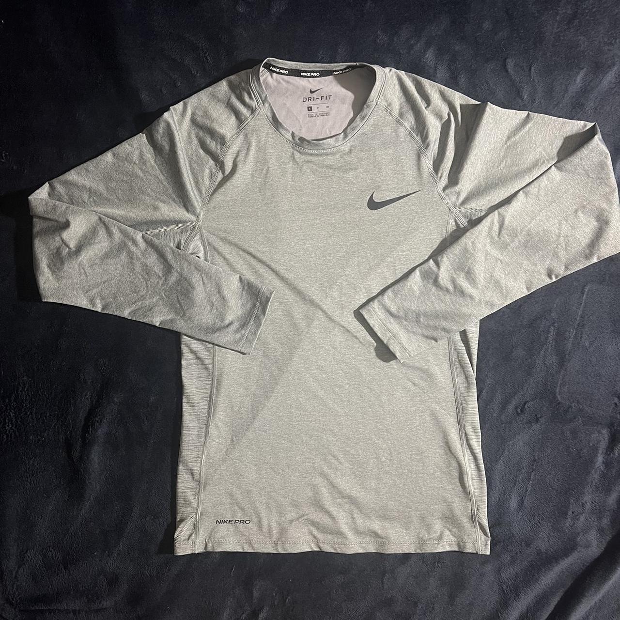 Grey Nike pro long sleeve compression shirt in good... - Depop