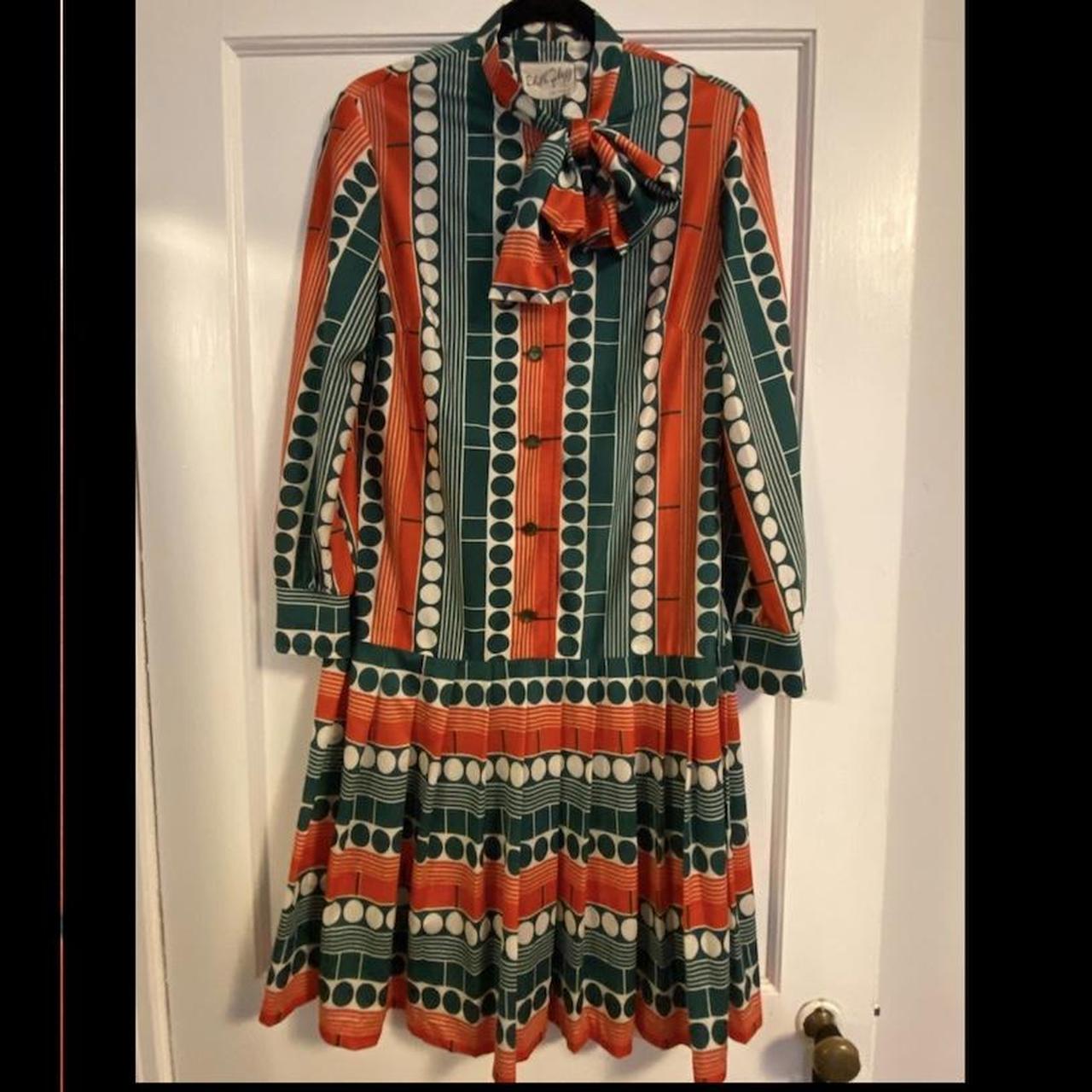 This vintage designer dress has a beautiful flow and... - Depop