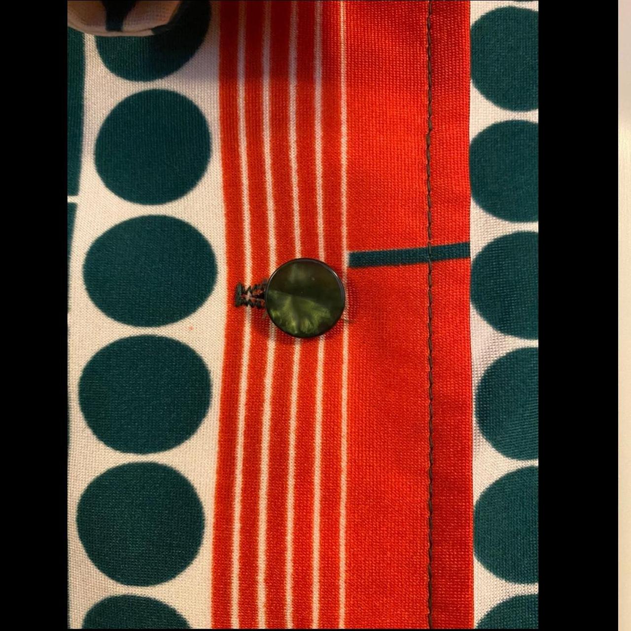 This vintage designer dress has a beautiful flow and... - Depop