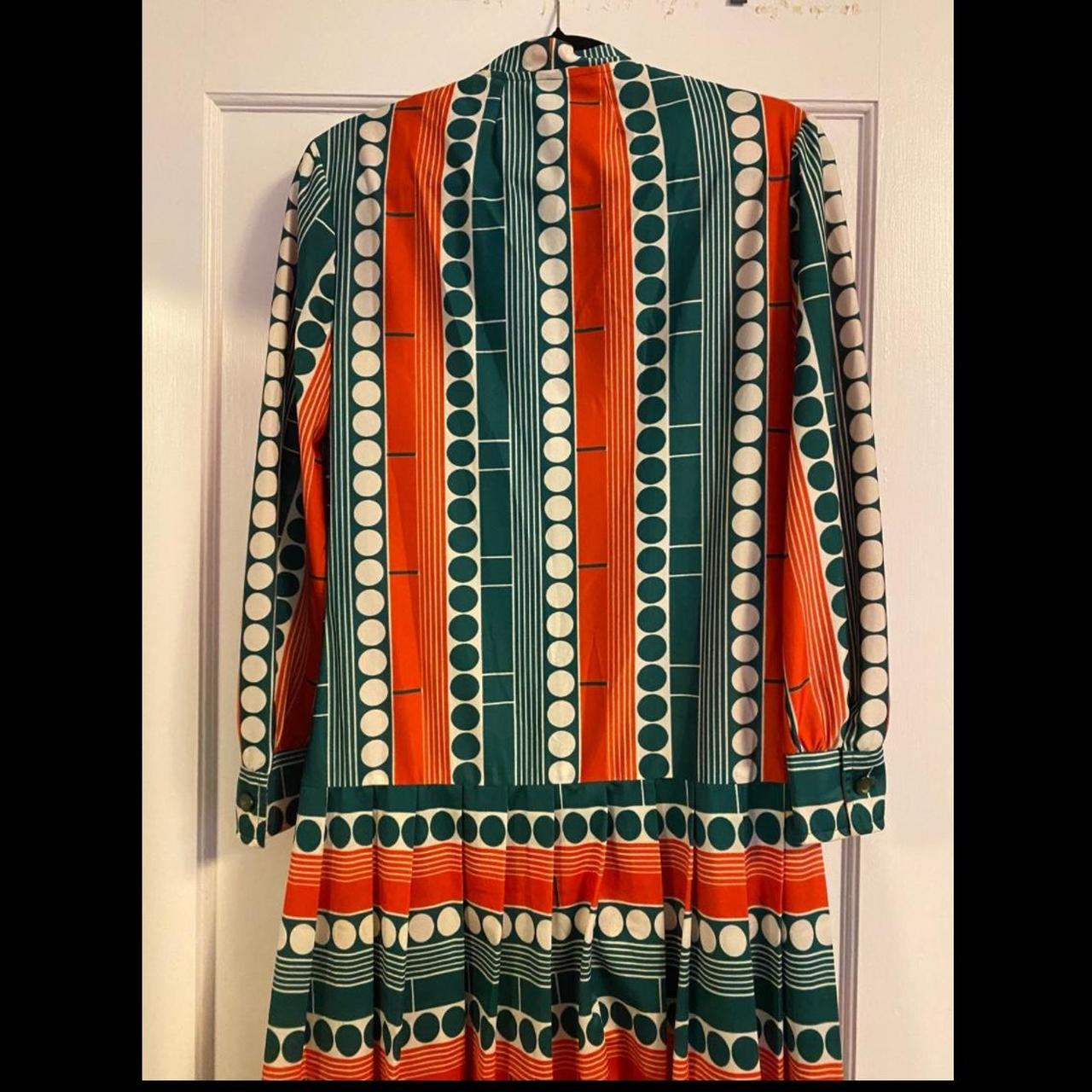 This vintage designer dress has a beautiful flow and... - Depop