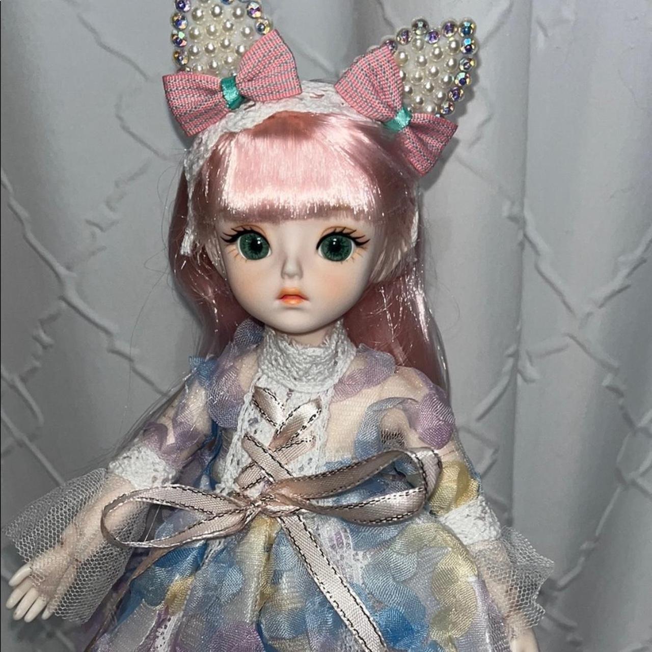 BJD doll with multi coloured dress with a touch of... | Depop