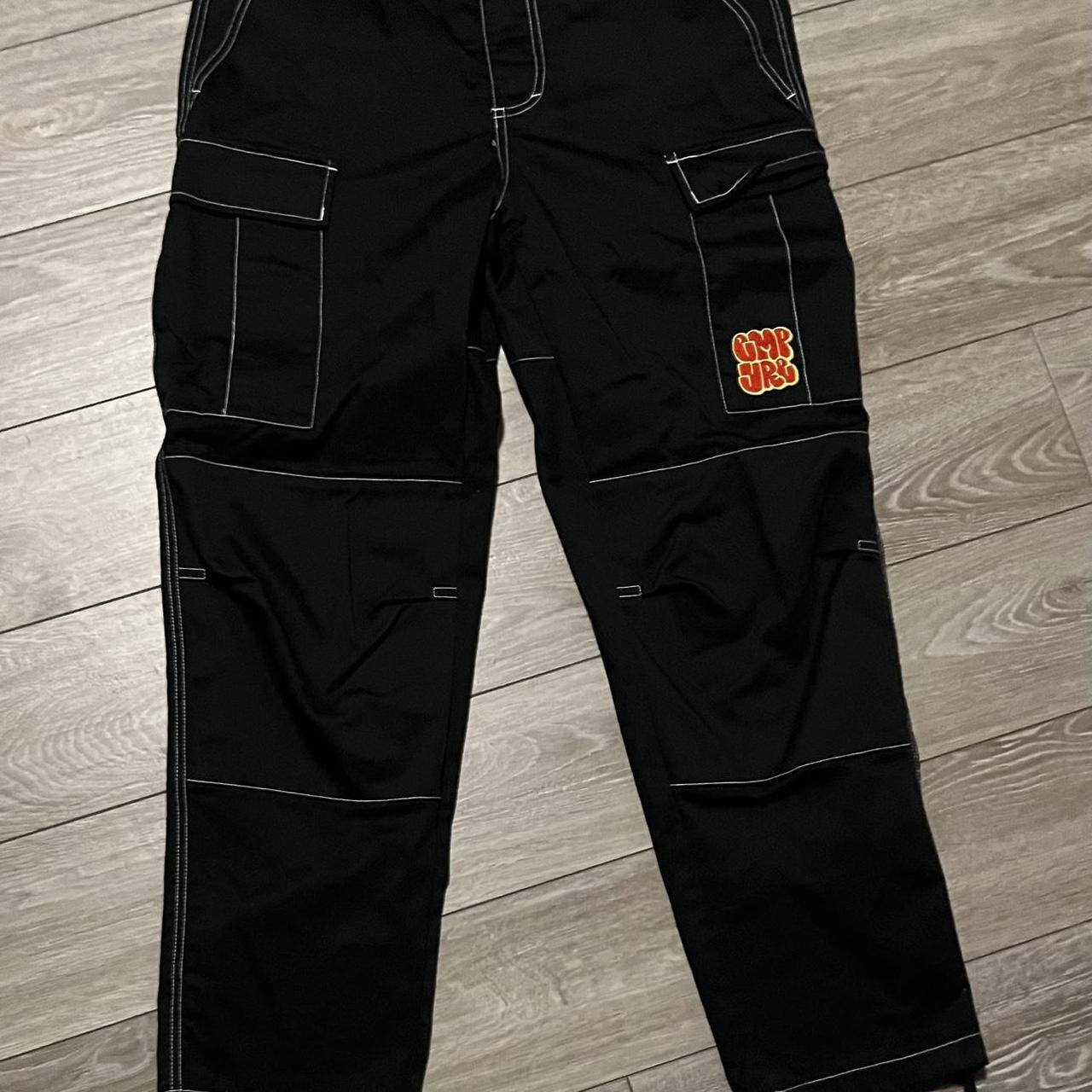 Empyres black cargos with white stiching size 30... - Depop