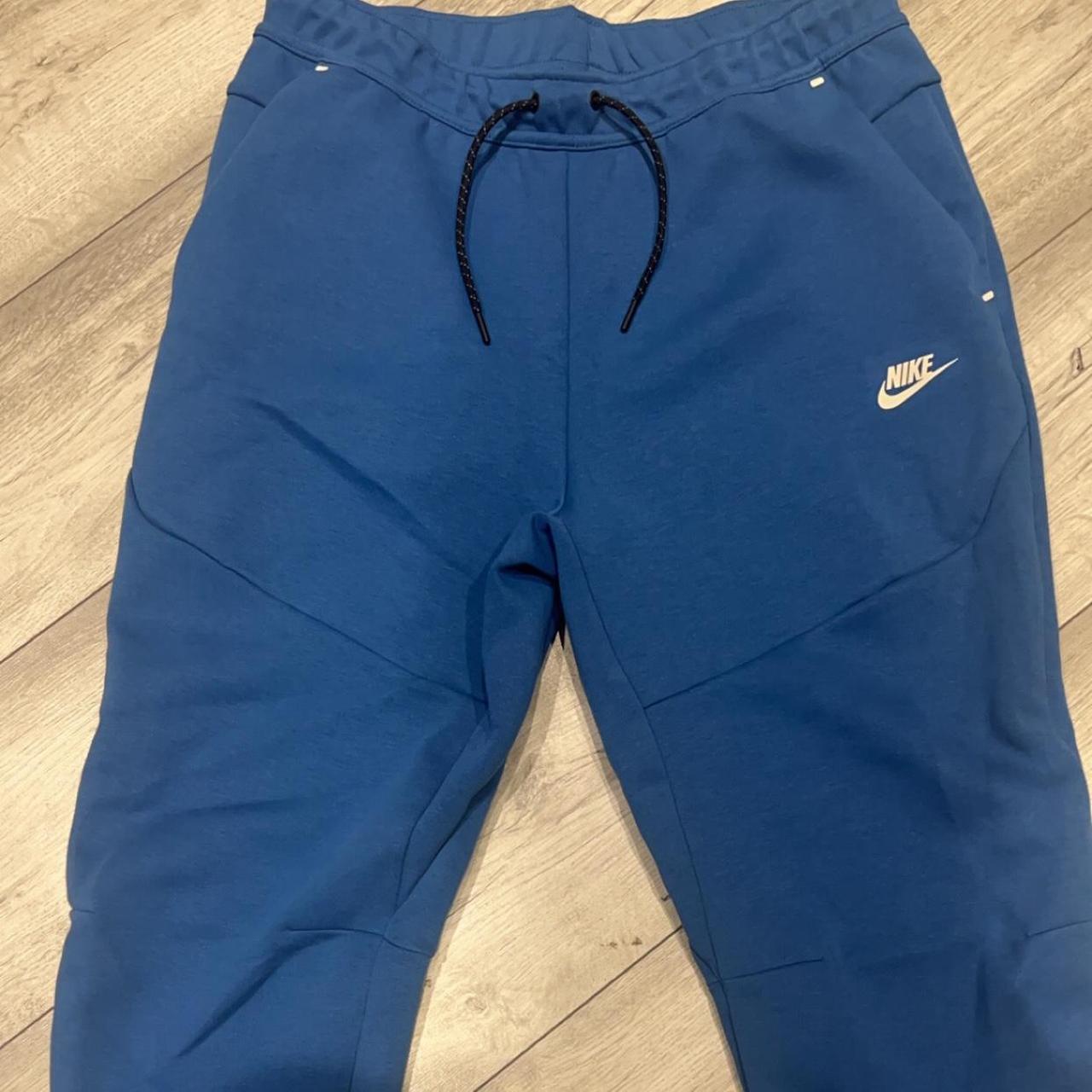 Large Blue Tech Fleece Nike Tracksuit bottoms , Can... - Depop