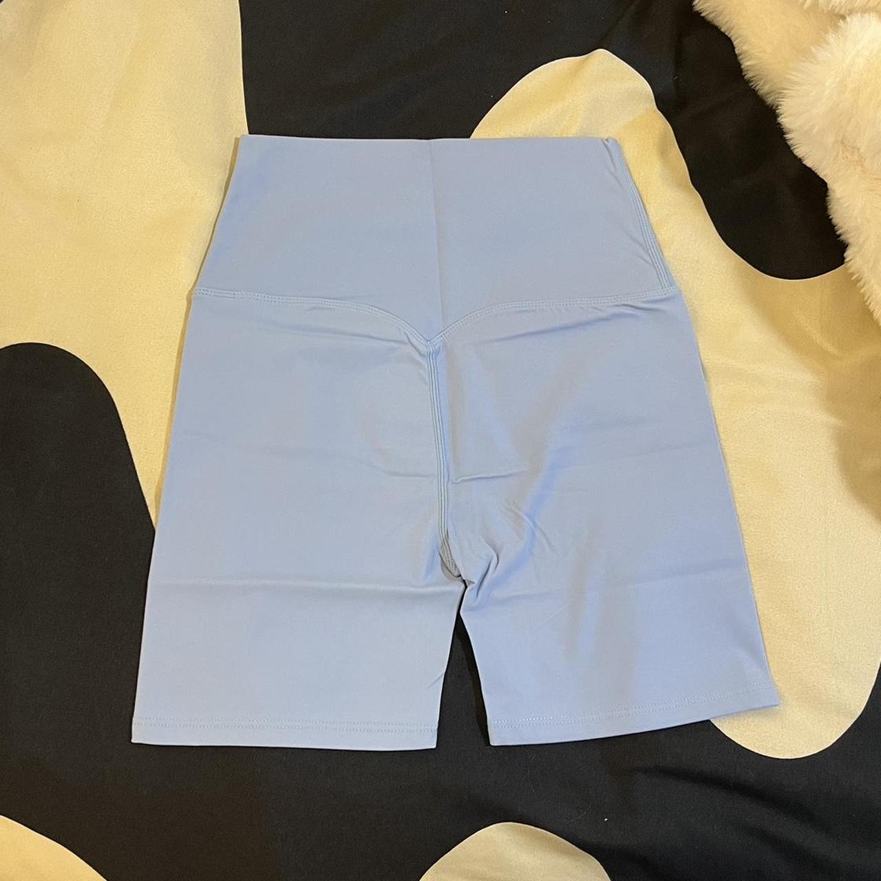 blue biker shorts material feels like lulu brand new... - Depop