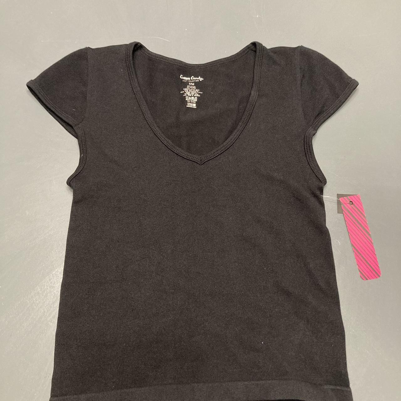 small, form-fitting black shirt - Depop