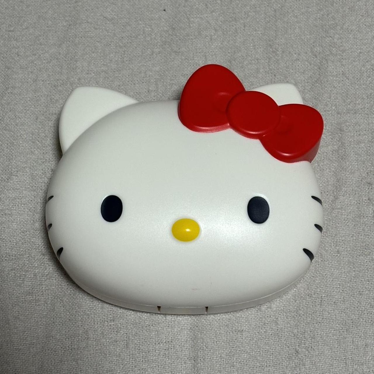 selling hello kitty compact eye contacts case for $15 - Depop