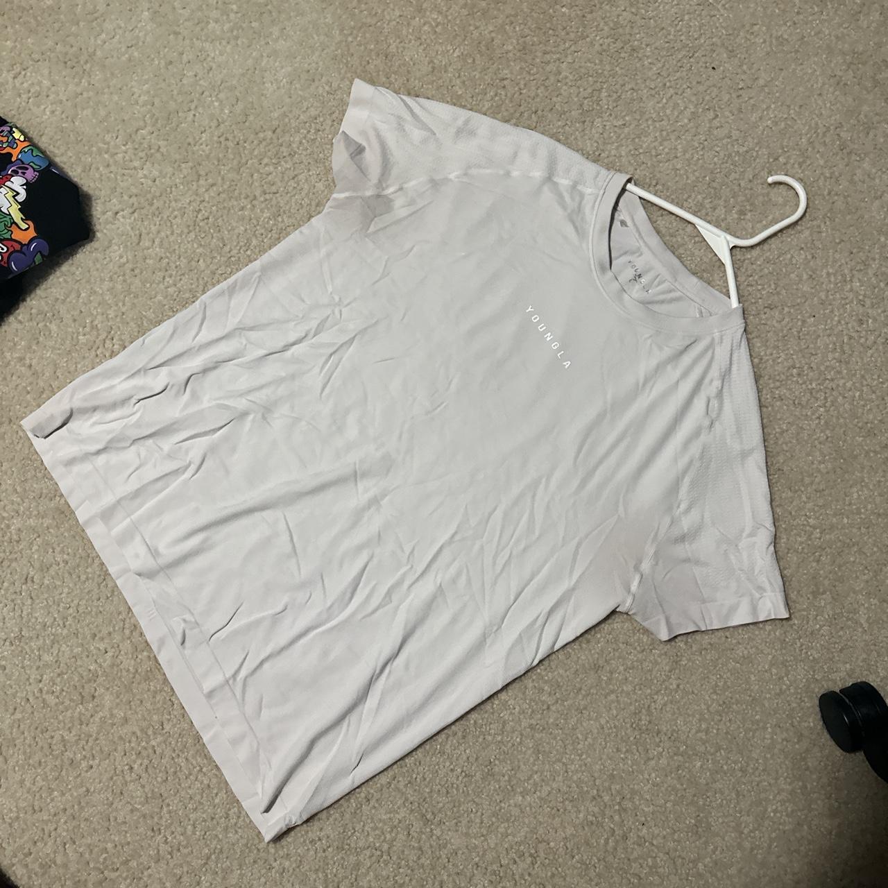 Large YLA all white compression shirt No flaws Good... - Depop