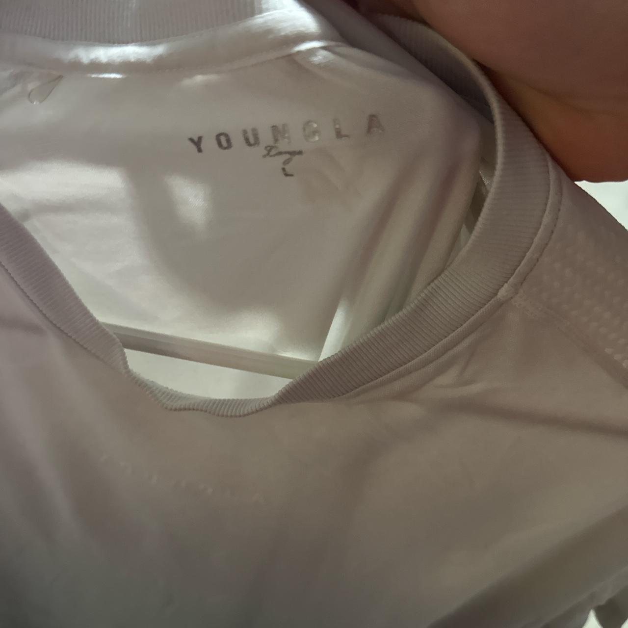 Large YLA all white compression shirt No flaws Good... - Depop