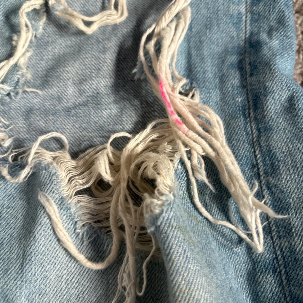 28x32 inch uniqlo ripped jeans, pink stain on left rip - Depop