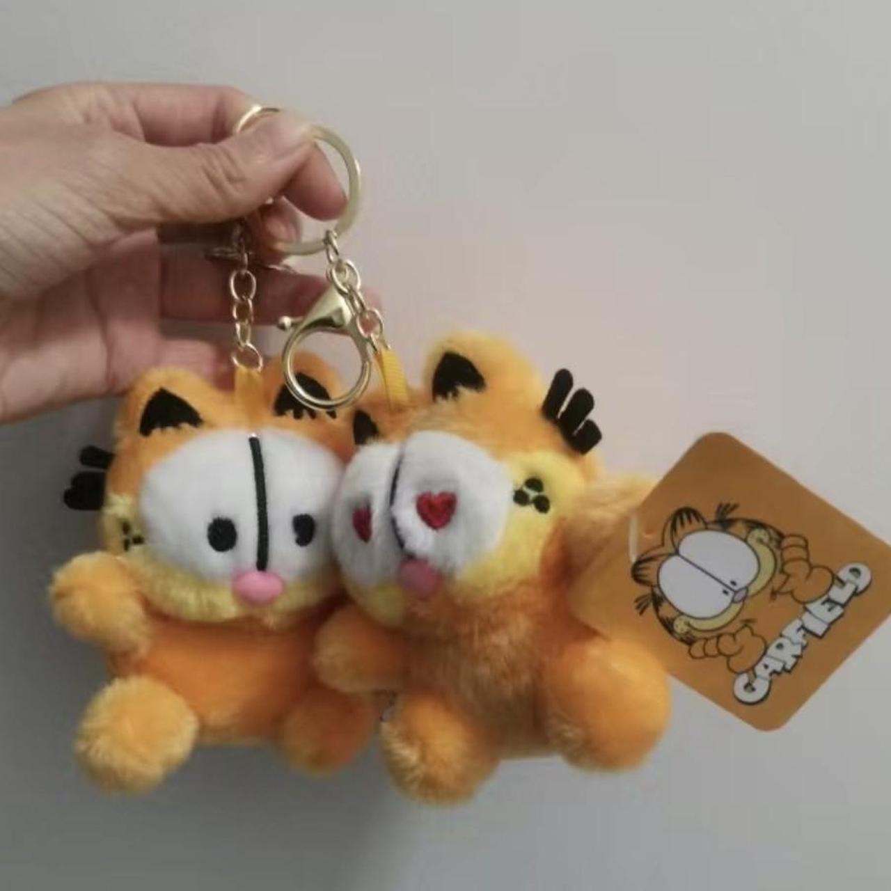 mini Garfield plushie with keychain message me to... - Depop
