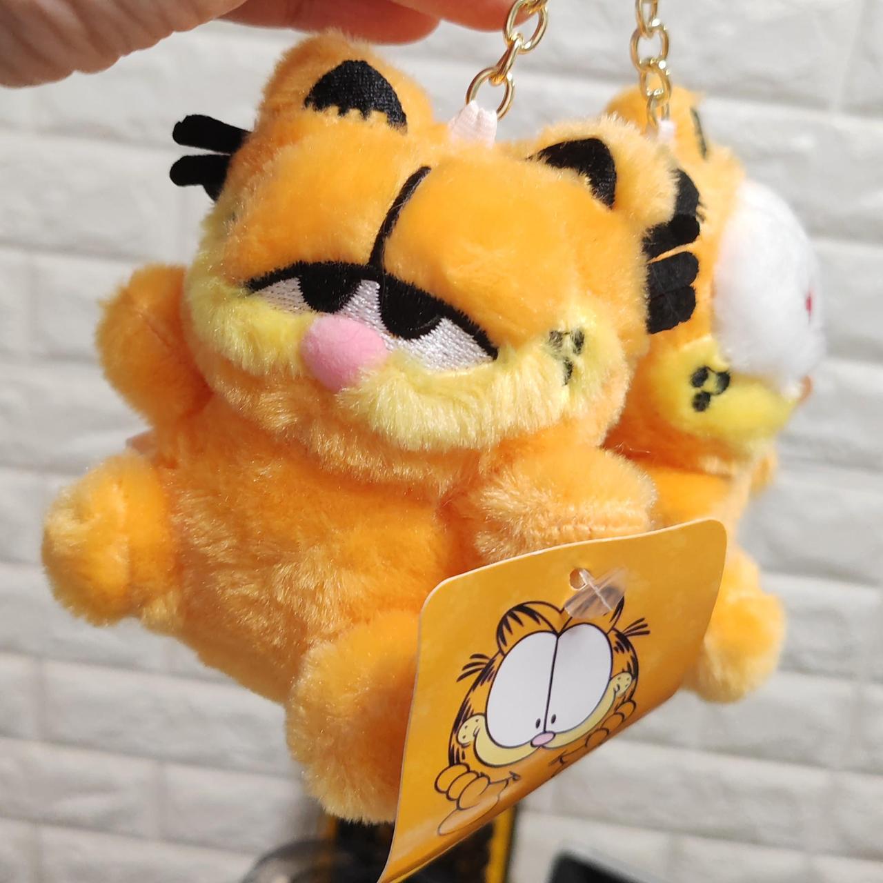 mini Garfield plushie with keychain half eye... - Depop