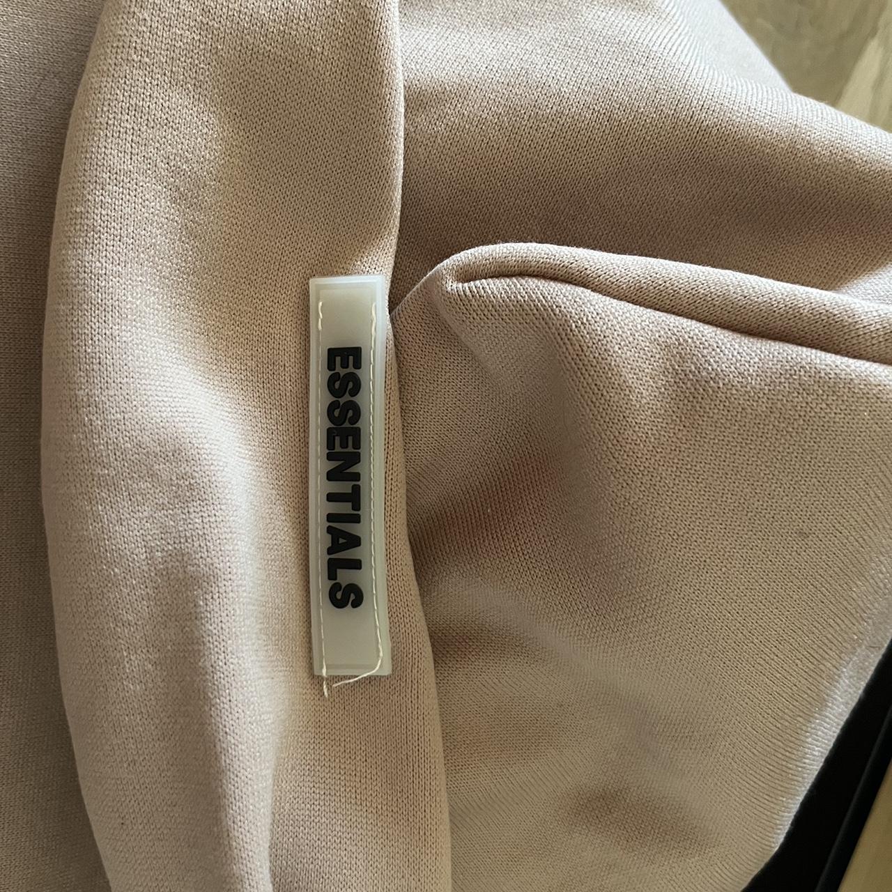 Essentials doupe hoodie Light brown color Writing... - Depop