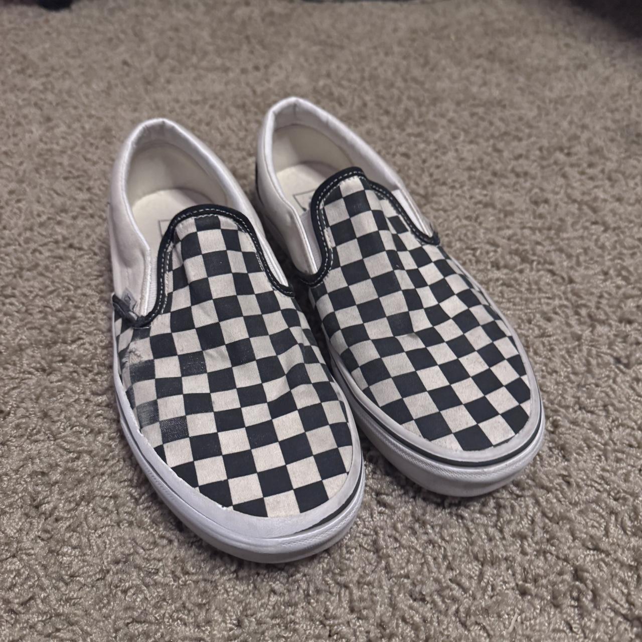 Black and white checkered Vans slip-ons were skated... | Depop