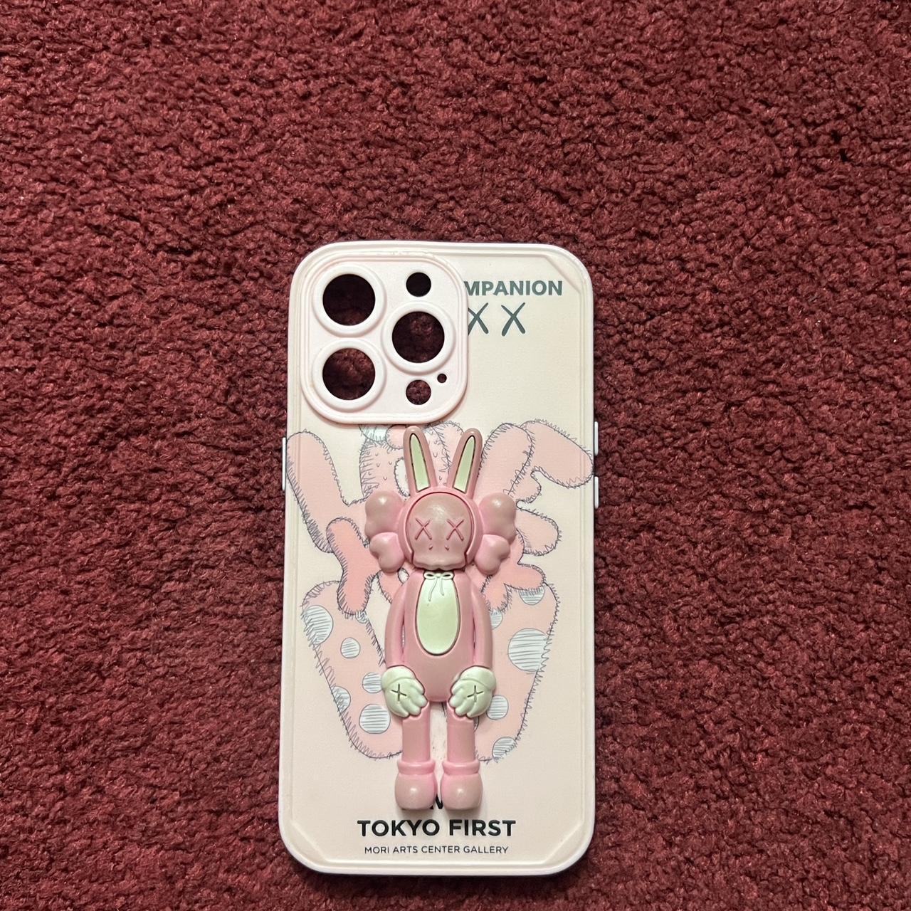 Pink and white KAWS phone case for iPhone 13 Pro ... | Depop