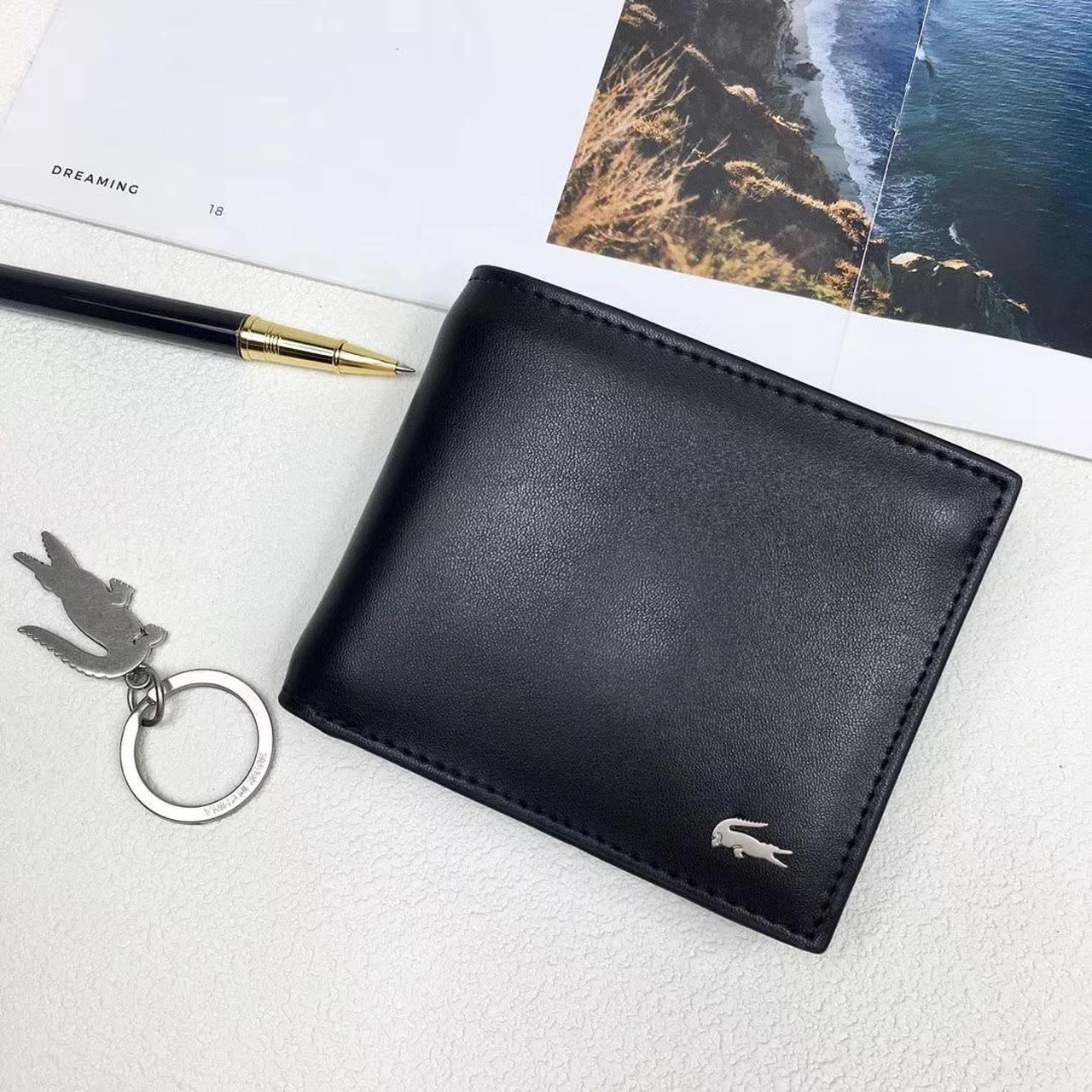 Lacoste wallet, black and leather with lot of cards... | Depop