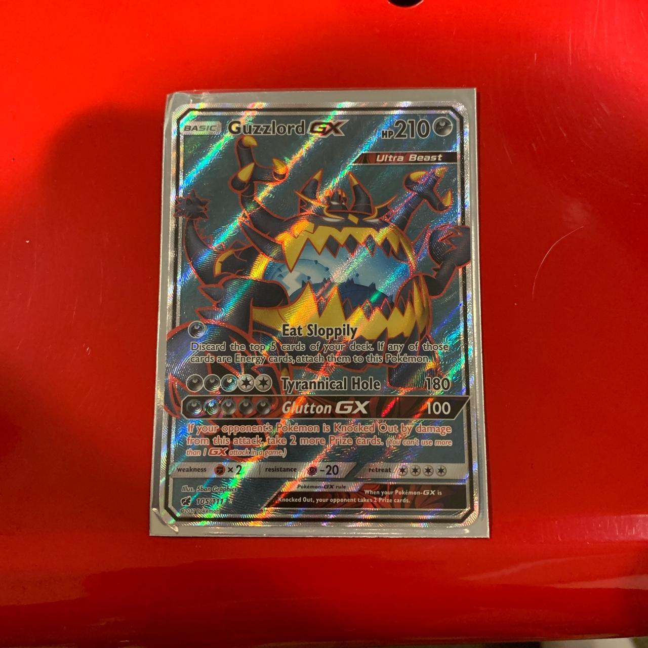 Guzzlord GX pokemon card (trading card game pack) - Depop