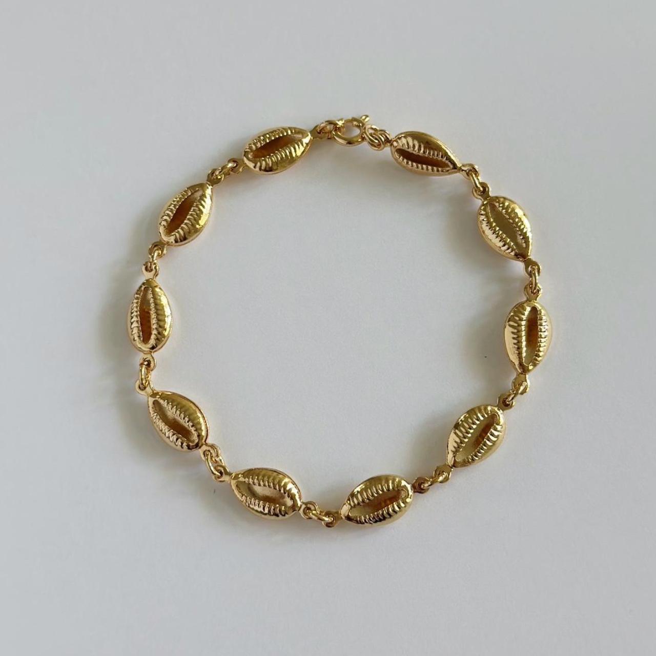 Gold shell bracelet bracelet length : 7 inches 18k... | Depop