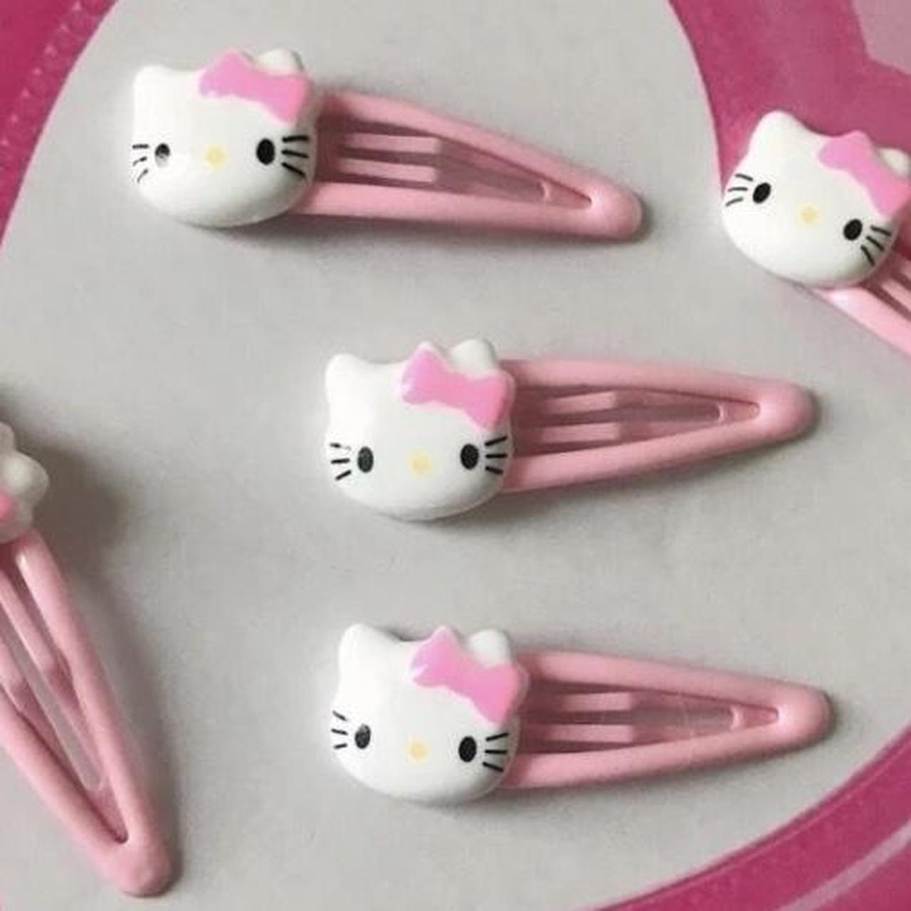 5 piece hello kitty hair clips - Depop