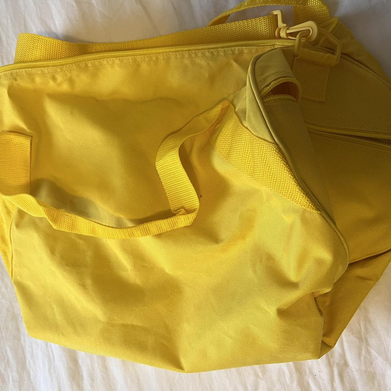 Glossier bright yellow gym bag. Unfortunately has an... - Depop