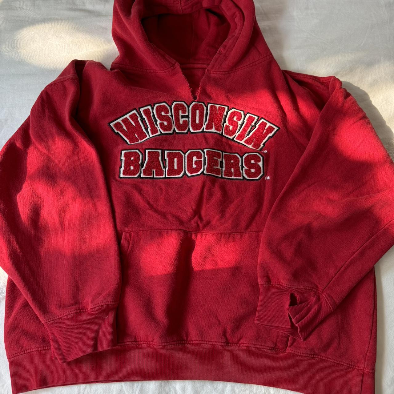 wisconsin hoodie rips on both sleeves (shown in... - Depop